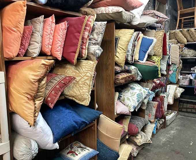 Decorative pillows pile high in every hue, offering instant comfort upgrades for any weary couch.