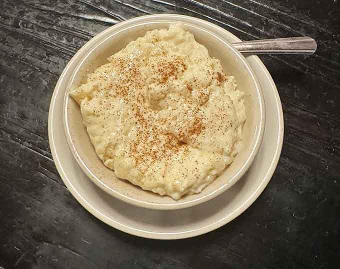 Rice pudding dusted with cinnamon. The kind of dessert your grandmother would approve of without hesitation.