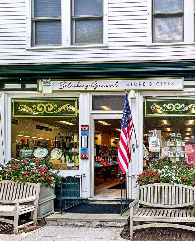 The Salisbury General Store and Gifts: two wooden benches out front, flowers blooming, and zero reasons to rush.