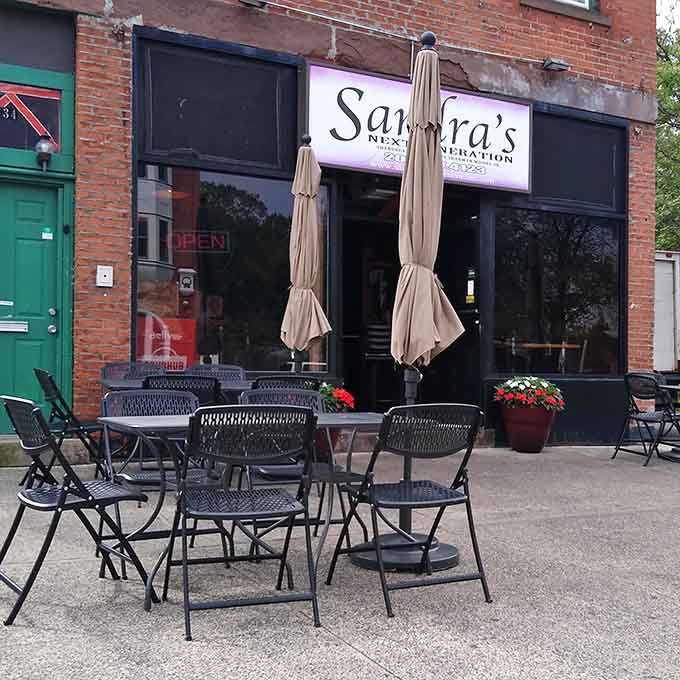 Outdoor seating with umbrellas offers the perfect spot for enjoying soul food under Connecticut's beautiful skies.