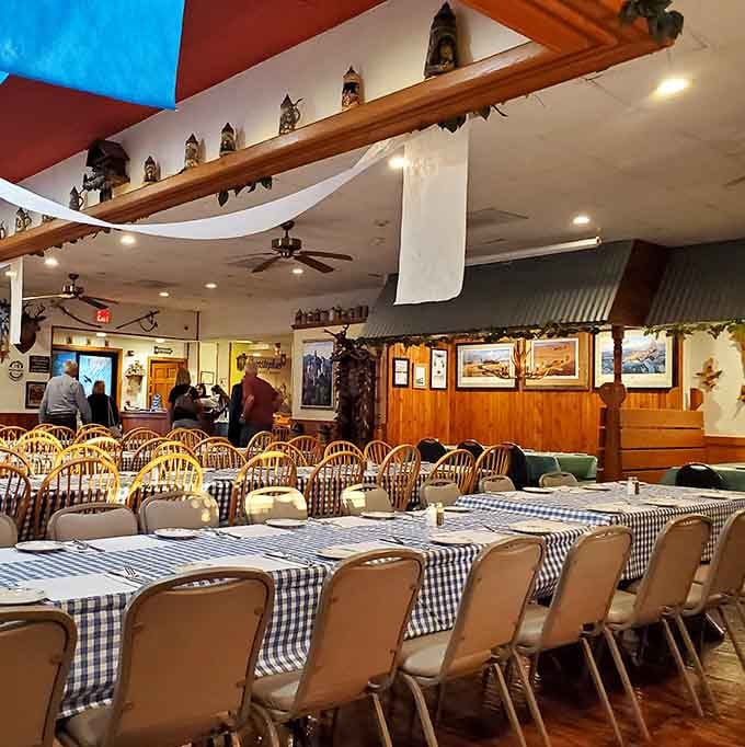 Long tables dressed in blue gingham, ready for a proper German feast. Pull up a chair, because this meal deserves your full attention.