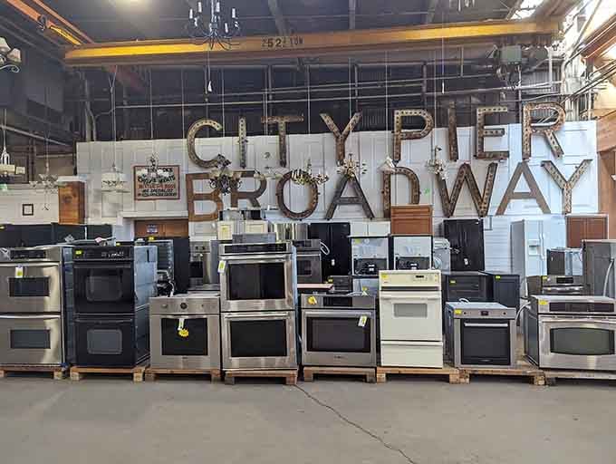 A full lineup of stoves and ovens standing at attention, ready to cook their next thousand meals in a new kitchen.