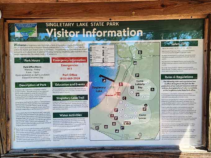 The visitor information board at Singletary Lake State Park. Read it carefully. It's the only orientation you'll get before the magic starts.
