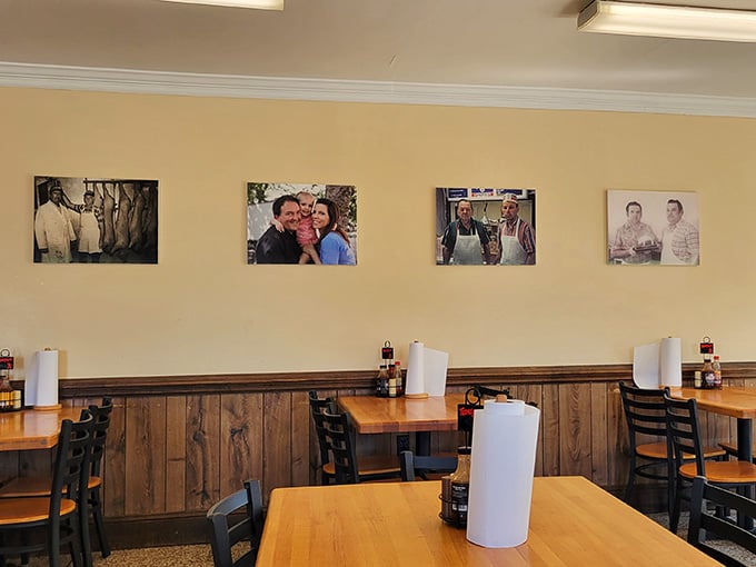 Large photos line the warm walls, turning every meal at Skylight Inn BBQ into a shared family experience.