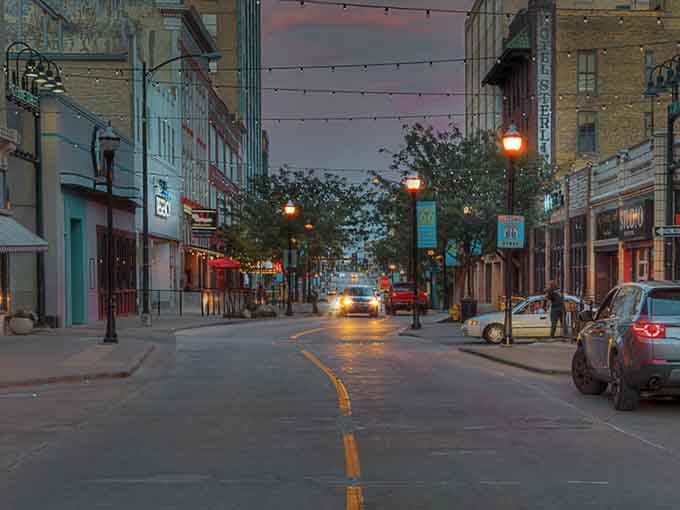 Walnut Street at night glows with string lights and possibility, the kind of scene that makes you want to linger.