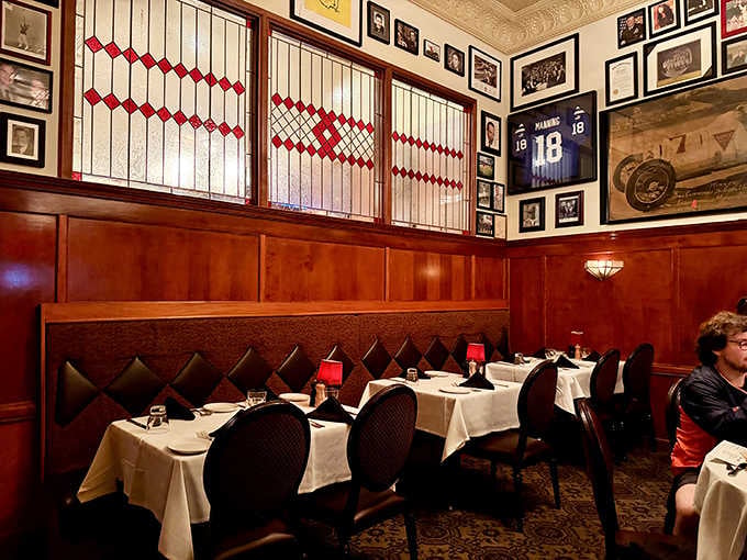 The long mahogany bar, pressed tin ceiling, and decades of good stories make this room feel genuinely irreplaceable.