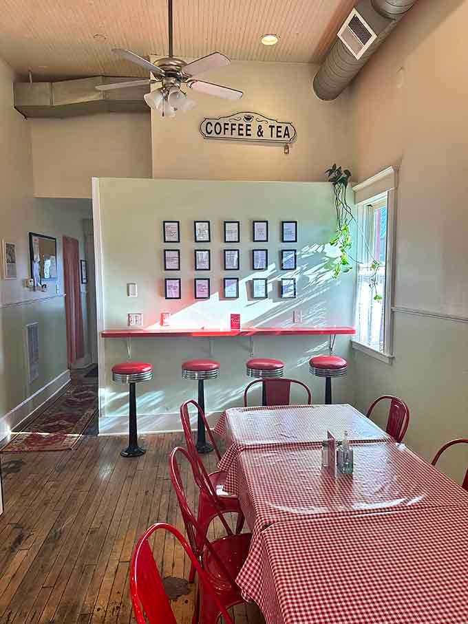 Classic diner stools and gingham tables create the perfect setting for contemplating life's important questions, like more pie.