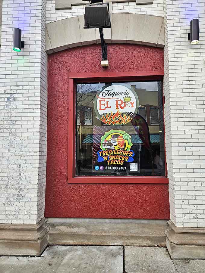 The window says it all. Tacos, snacks, and tres leches. That's a menu worth crossing town for.