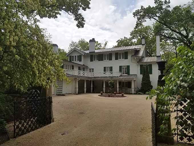 The grand front approach of Ten Chimneys sets the tone before you've even stepped through the door.