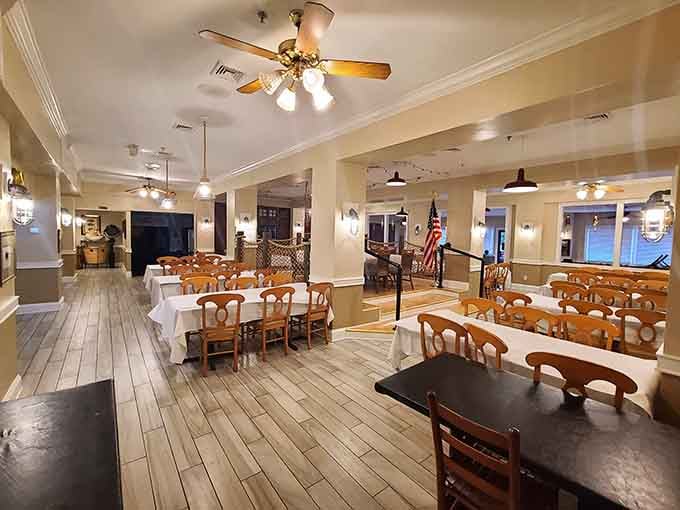 Clean, bright dining spaces with American flags remind you this is classic coastal dining done the right way.