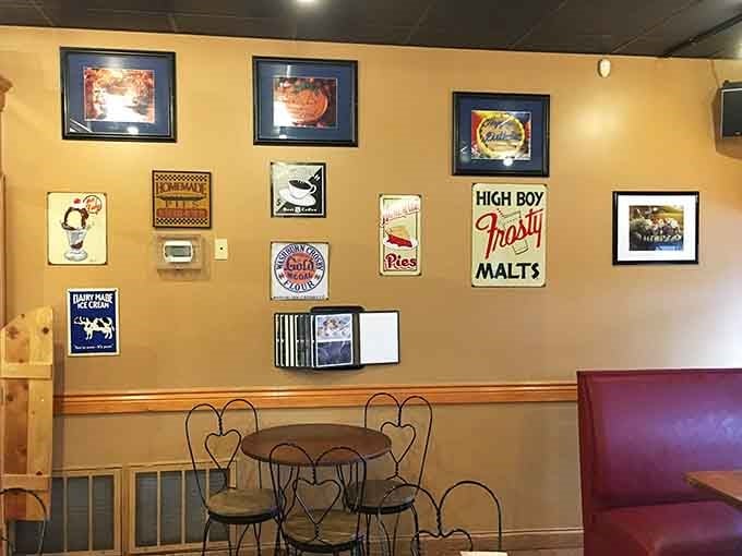Vintage signs covering the warm walls, each one telling a small story about simpler, sweeter times.