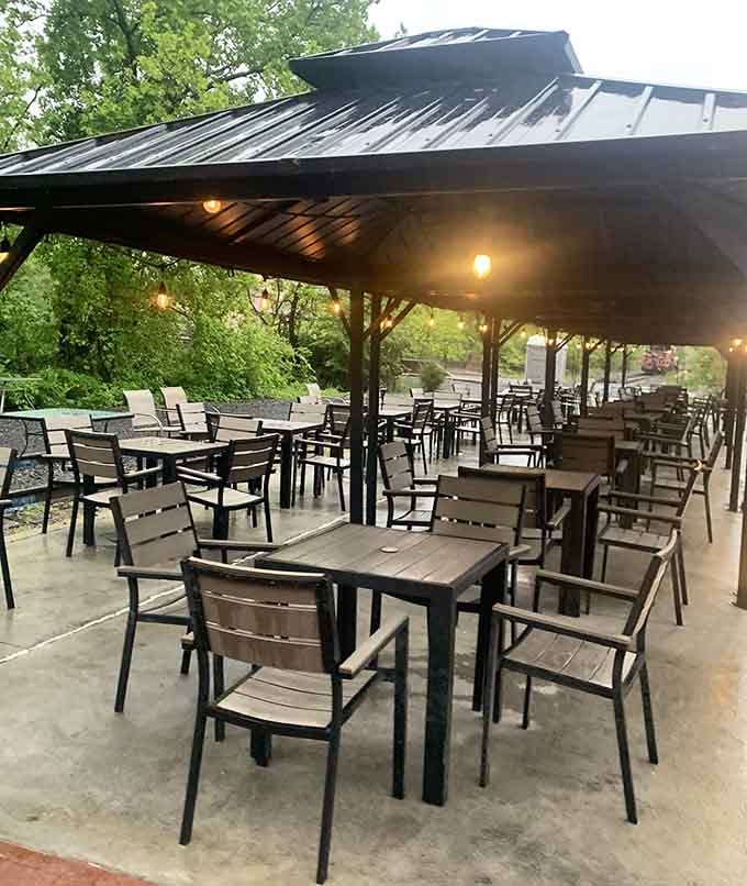 A covered outdoor patio that says, "Stay a while," even when the weather has other opinions entirely.