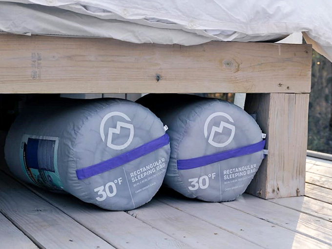 Two 30-degree sleeping bags stored right under the bed. Cold nights in the Georgia woods? Completely handled.