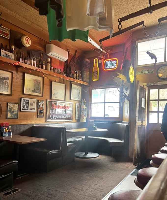 Cozy booths and neon signs create that perfect tavern vibe where you want to linger just a little longer.
