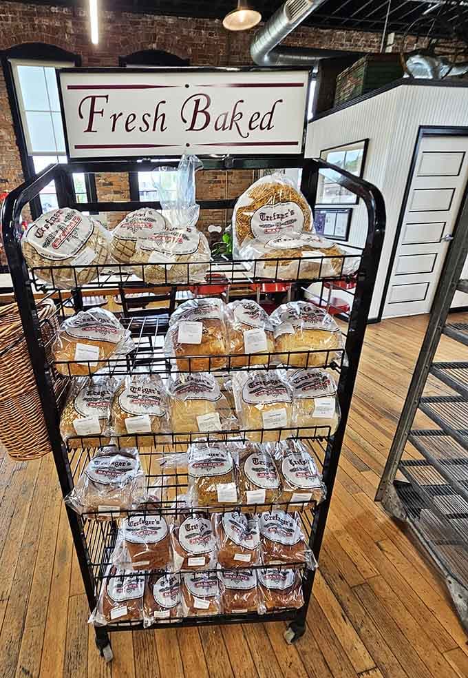 A whole rack labeled "Fresh Baked" and stacked with packaged loaves. Take one home. Take three. Nobody's judging you here.