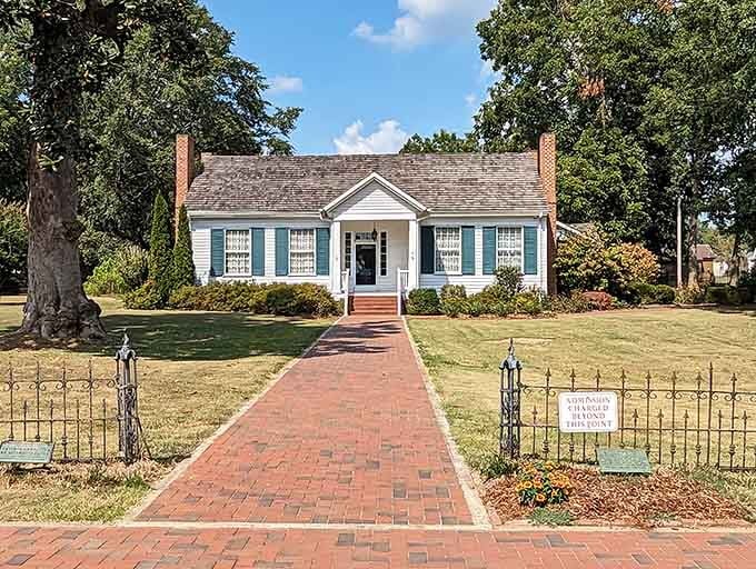 That brick walkway leads straight to one of the most quietly powerful historic homes anywhere in the American South.
