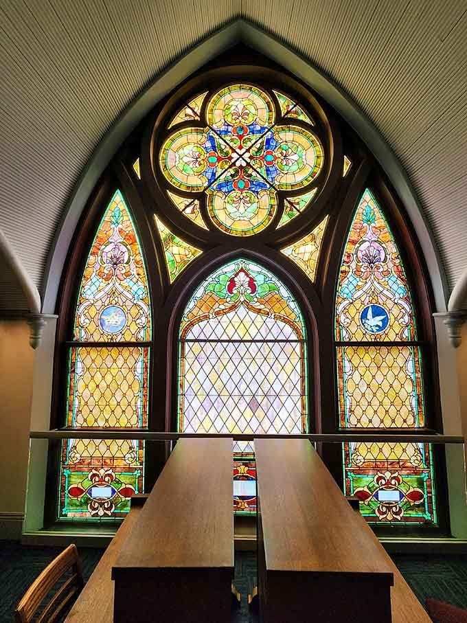 Stained glass windows filter light in ways that make you want to grab a book and settle in.