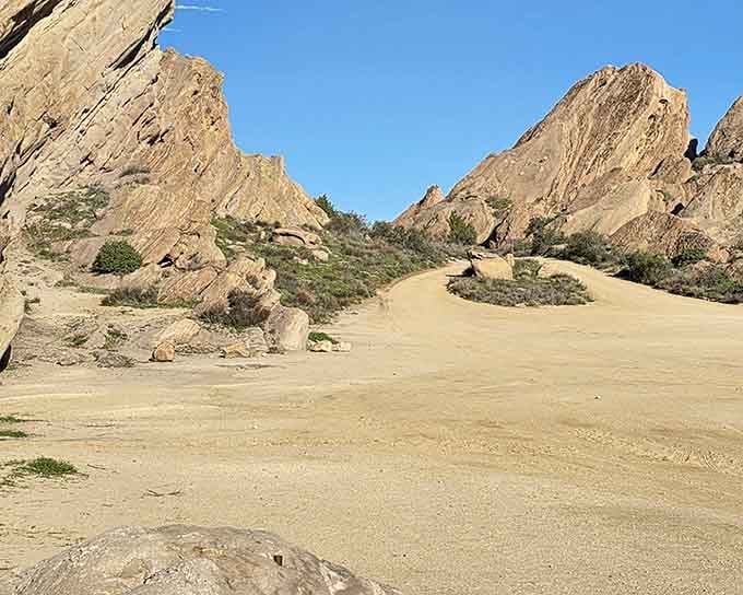 Sandy corridors between towering rocks, the kind of scenery that makes filmmakers weep with gratitude.