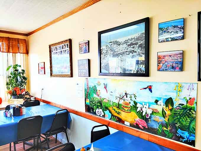 Framed photos, a colorful painted mural, and a "Welcome to the Lake" sign. Walt's walls tell Caseville's whole story.