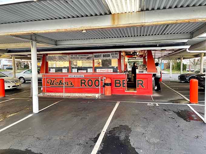 Even on a rainy day, Weber's bold red stand and covered canopy look like the coziest spot in town.