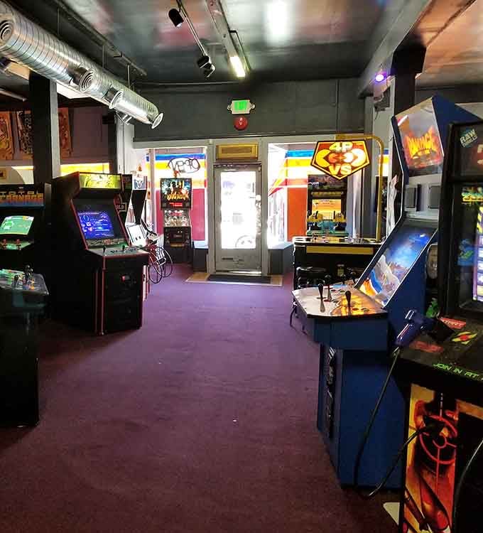 Vintage cabinets near the entrance at 8-Bit Arcade greet you like old friends you almost forgot.