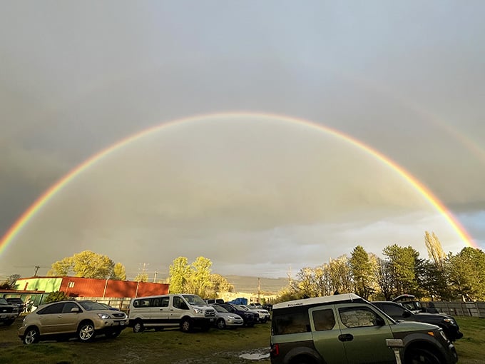 A full double rainbow arching over the drive-in lot. Oregon really does put on a show before the show.