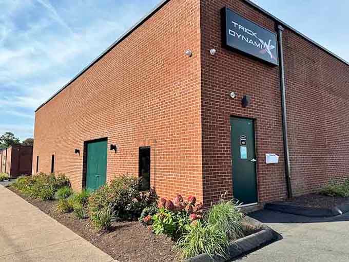 The unassuming entrance to Manchester's best-kept secret, where ordinary people become foam dart warriors and parkour enthusiasts.