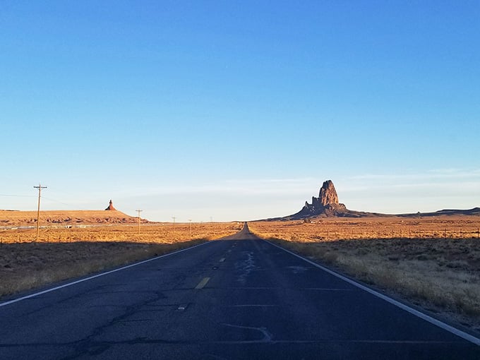 The open road, endless sky, and a rock formation that's been stealing hearts for millennia.