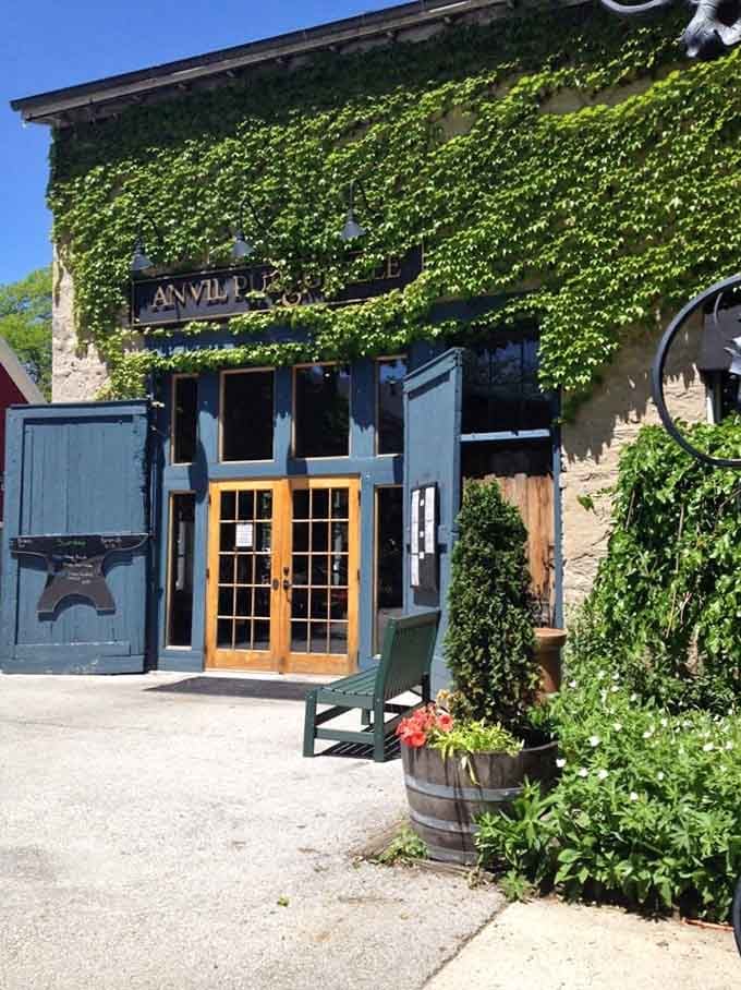 Barrel planters, climbing ivy, and French doors flung open wide &mdash; the Anvil Pub & Grille's entrance looks like it was designed by someone who genuinely loves a good first impression.
