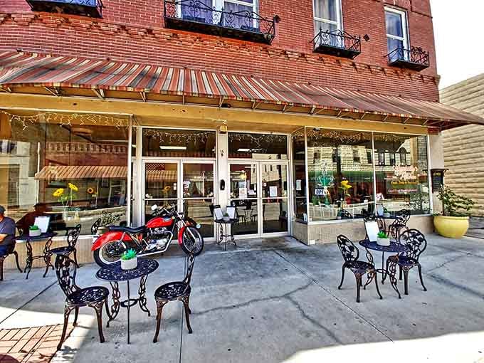 A vintage red motorcycle parked outside Myshelly's Kitchen sets the scene perfectly, equal parts neighborhood charm and just enough personality to make you smile.