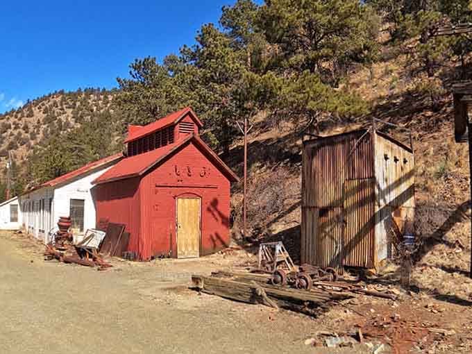 Red buildings, rusted corrugated iron, and mountain pines. The Argo's outbuildings tell their own quiet, weathered story.