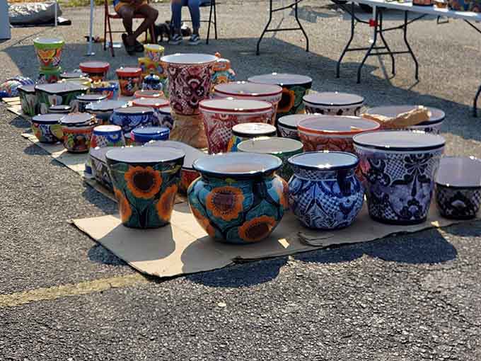 Hand-painted pottery in bold, beautiful patterns, the kind of pieces that make a porch look spectacular.