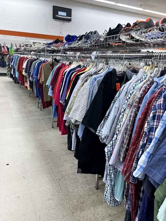 Men's shirts packed tightly on the rack, plaids and solids side by side. Your next favorite shirt is probably hiding right in there.