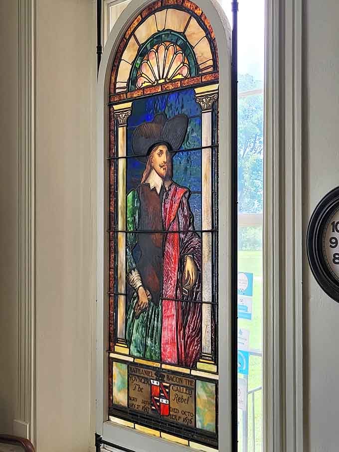 Nathaniel Bacon himself, immortalized in stained glass, looking like he has absolutely no regrets about any of it.
