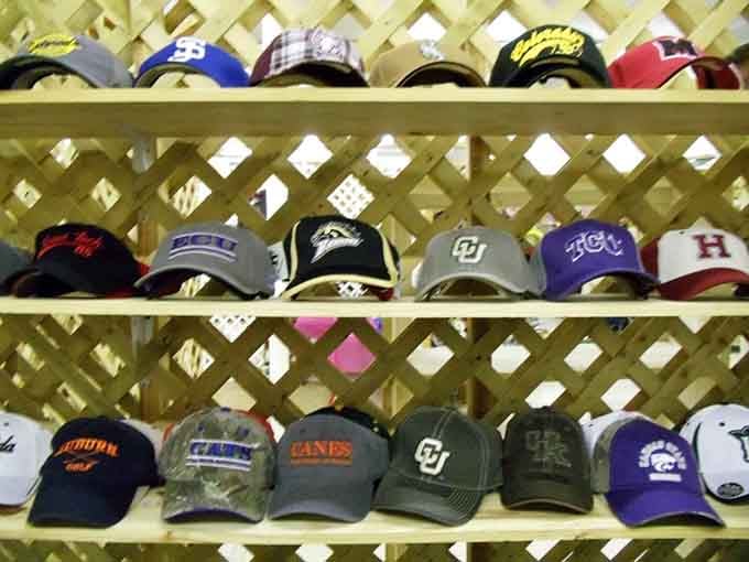 Rows of caps representing teams from coast to coast, because a good hat is always worth finding.