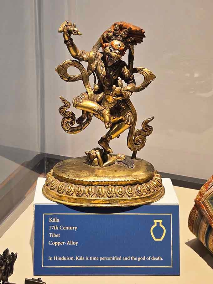 Kāla, the 17th-century Tibetan copper-alloy god of time and death, dancing with an energy that still feels very much alive.