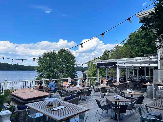 The expansive deck overlooks Long Lake, offering the kind of views that make you linger over coffee.