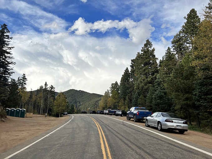 Roadside parking fills quickly on nice days as word spreads about Colorado's most unexpected architectural wonder hidden in these mountains.