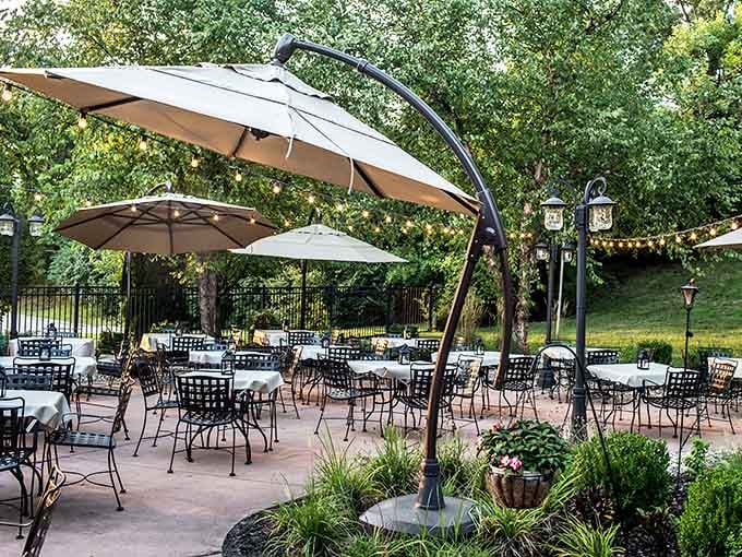 String lights, market umbrellas, and tree-lined seating that transforms an ordinary evening into something worth remembering.