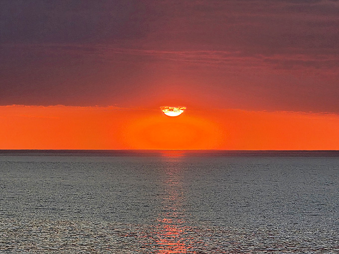 Lake Superior sunsets don't ease into the evening. They absolutely ignite the whole sky without apology.