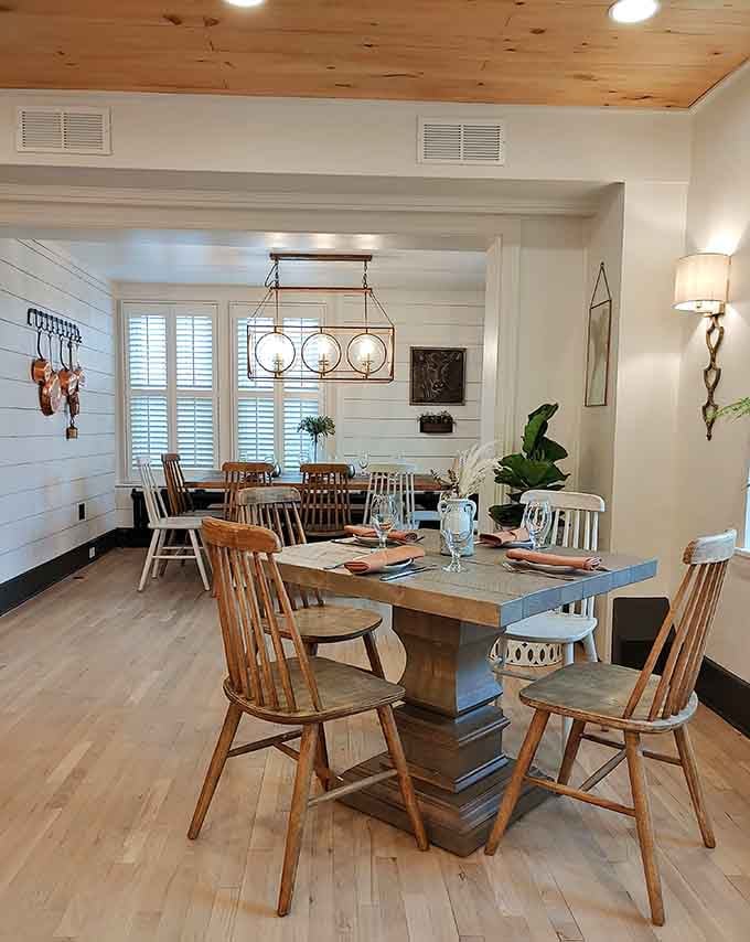 Copper pots on the wall, pine ceilings, and a table set for a real meal. Bloom makes every visit feel like a special occasion.