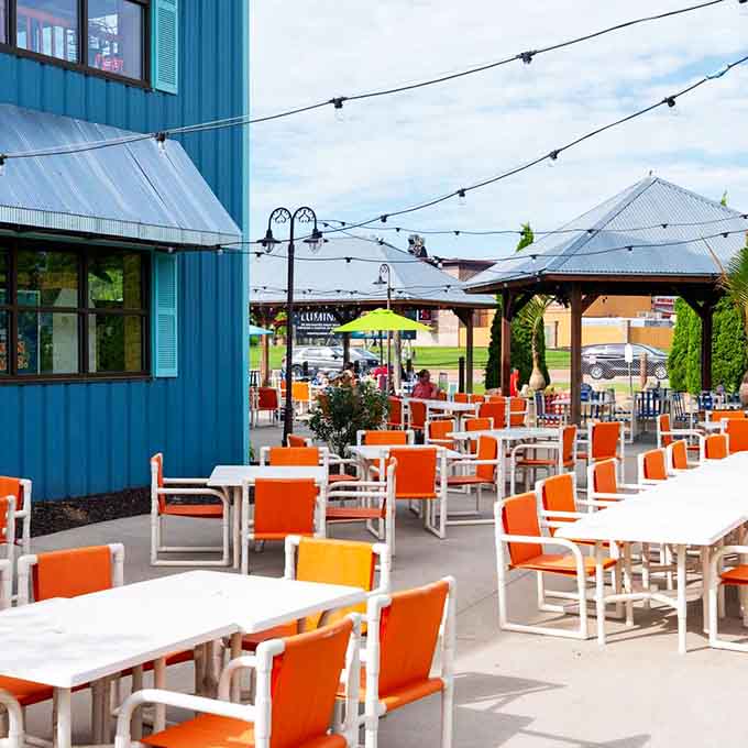 Outside seating in bright orange chairs turns dining into an al fresco adventure, weather and Wisconsin mosquitoes permitting.