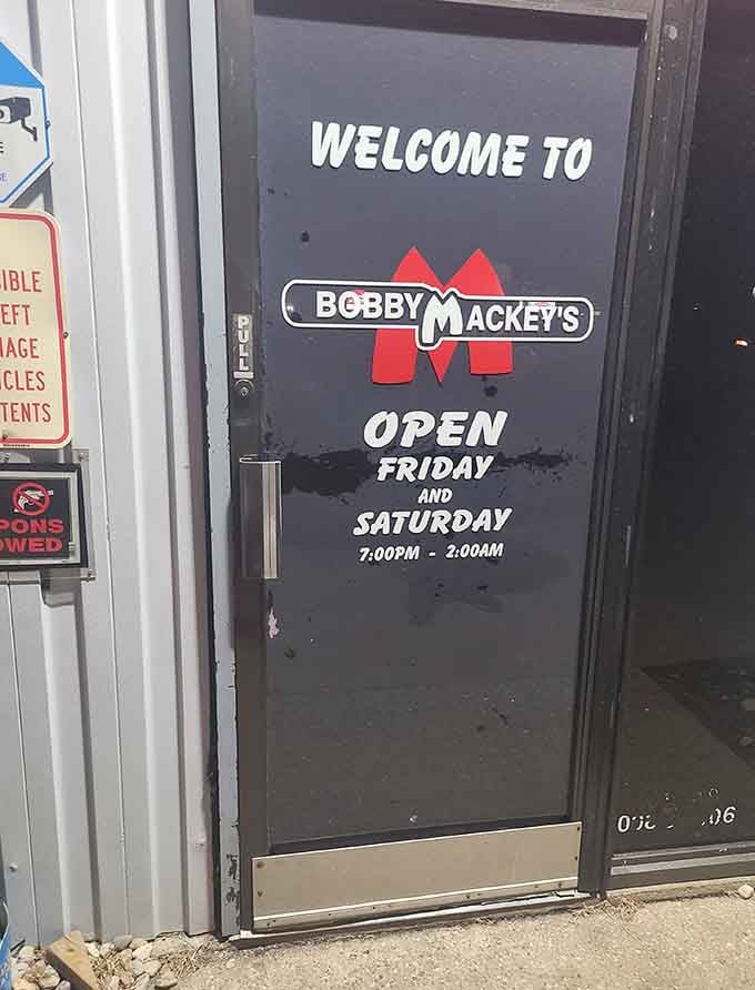 Weekend hours posted on the door, inviting you to step inside if you dare to experience it.