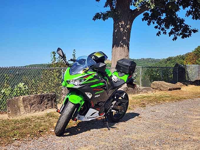 Even motorcycles make the pilgrimage to Brady's Bend Overlook, because some views simply demand the most scenic route possible.