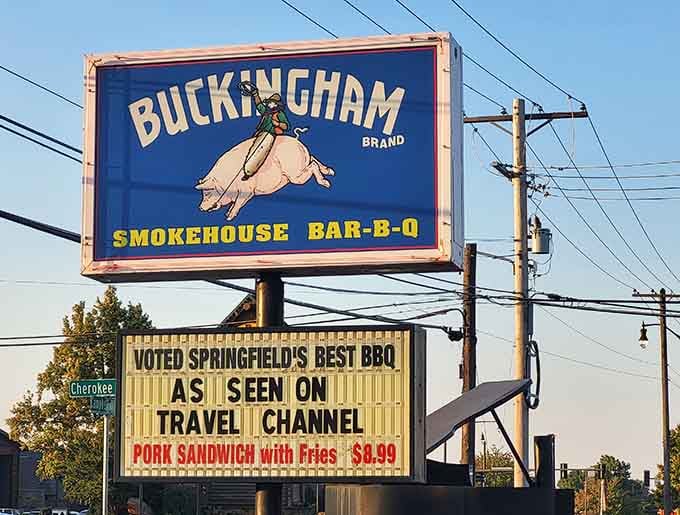 A pig riding a jockey on a billboard that also says "As Seen On Travel Channel." Springfield, you had us at the pig.