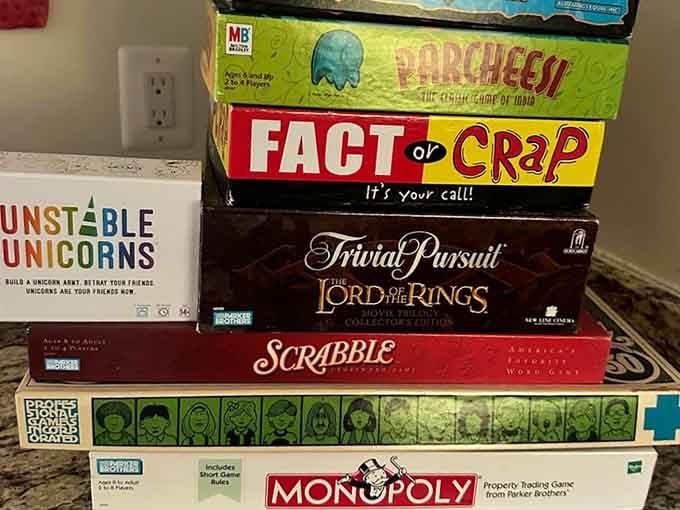 Board games stacked high because apparently castles are where families actually talk to each other without screens intervening.
