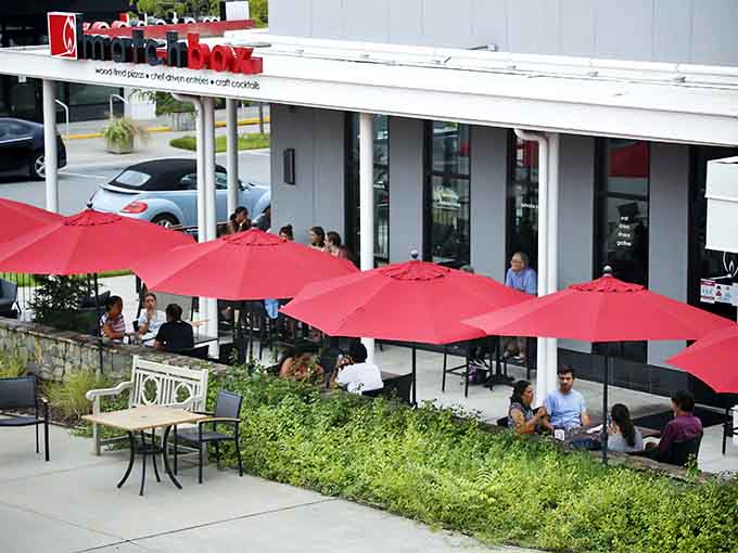 Matchbox brings wood-fired pizza and craft cocktails under a row of bold red umbrellas, because some meals are just better enjoyed outside.