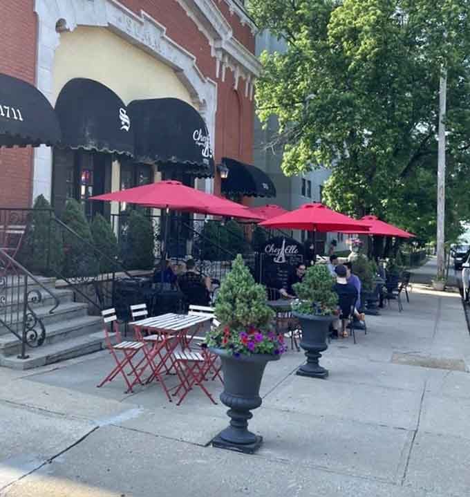 Red umbrellas, iron chairs, large planters full of flowers &mdash; the Chez Elle patio is the kind of spot you text your friends about immediately.