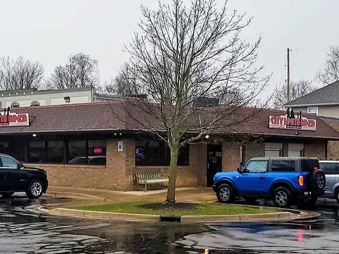 The parking lot view on a rainy morning somehow makes the promise of hot coffee and pancakes even more appealing.