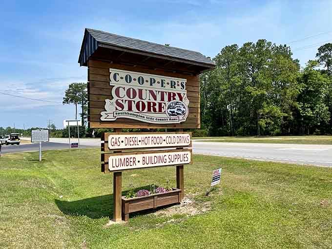 The sign says gas, diesel, hot food, cold drinks, and lumber. Cooper's Country Store truly does it all.